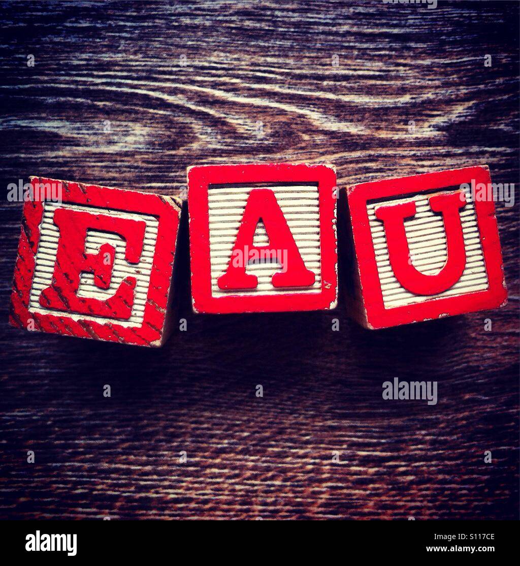 French word EAU for WATER, done with wood blocks alphabet letters Stock ...