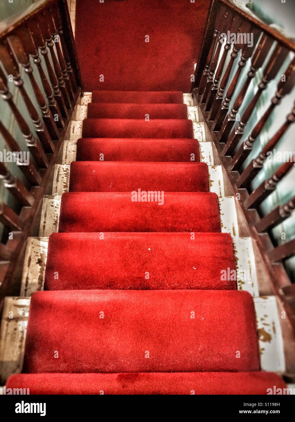 Looking down flight of stairs Stock Photo - Alamy