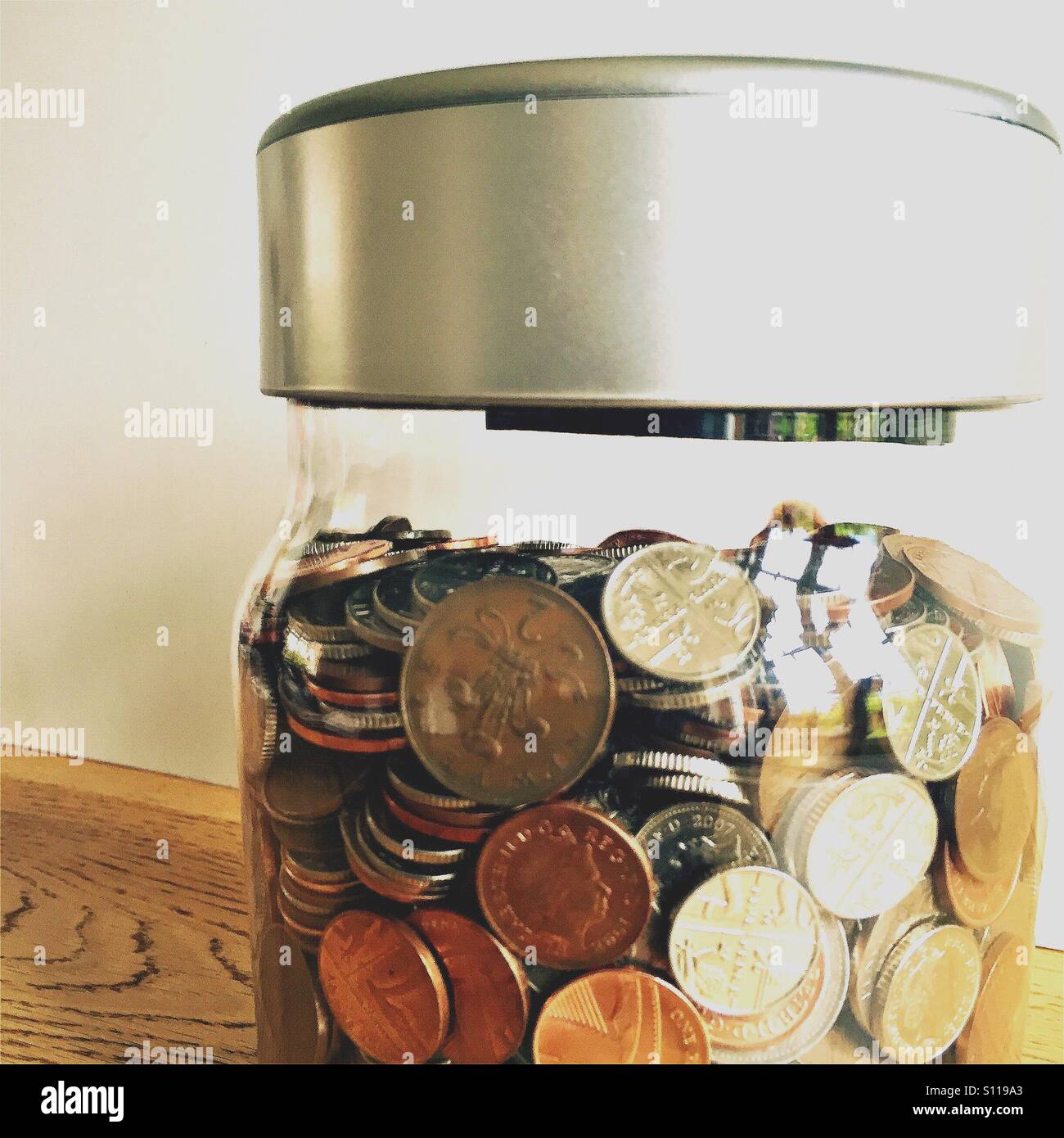 Jar full pennies hi-res stock photography and images - Alamy
