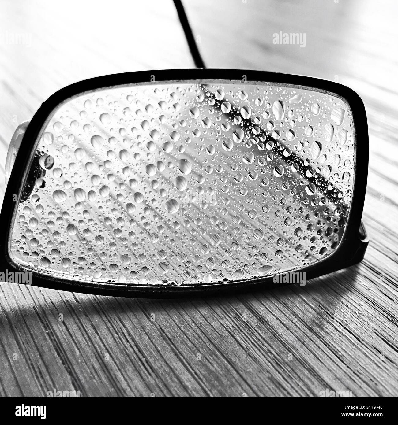 Raindrops on glasses Stock Photo - Alamy