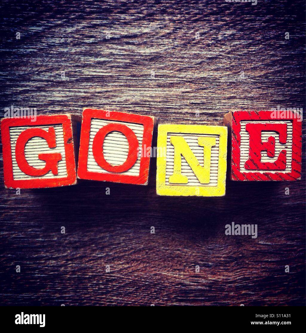 Word GONE done with alphabet wood blocks letters Stock Photo - Alamy