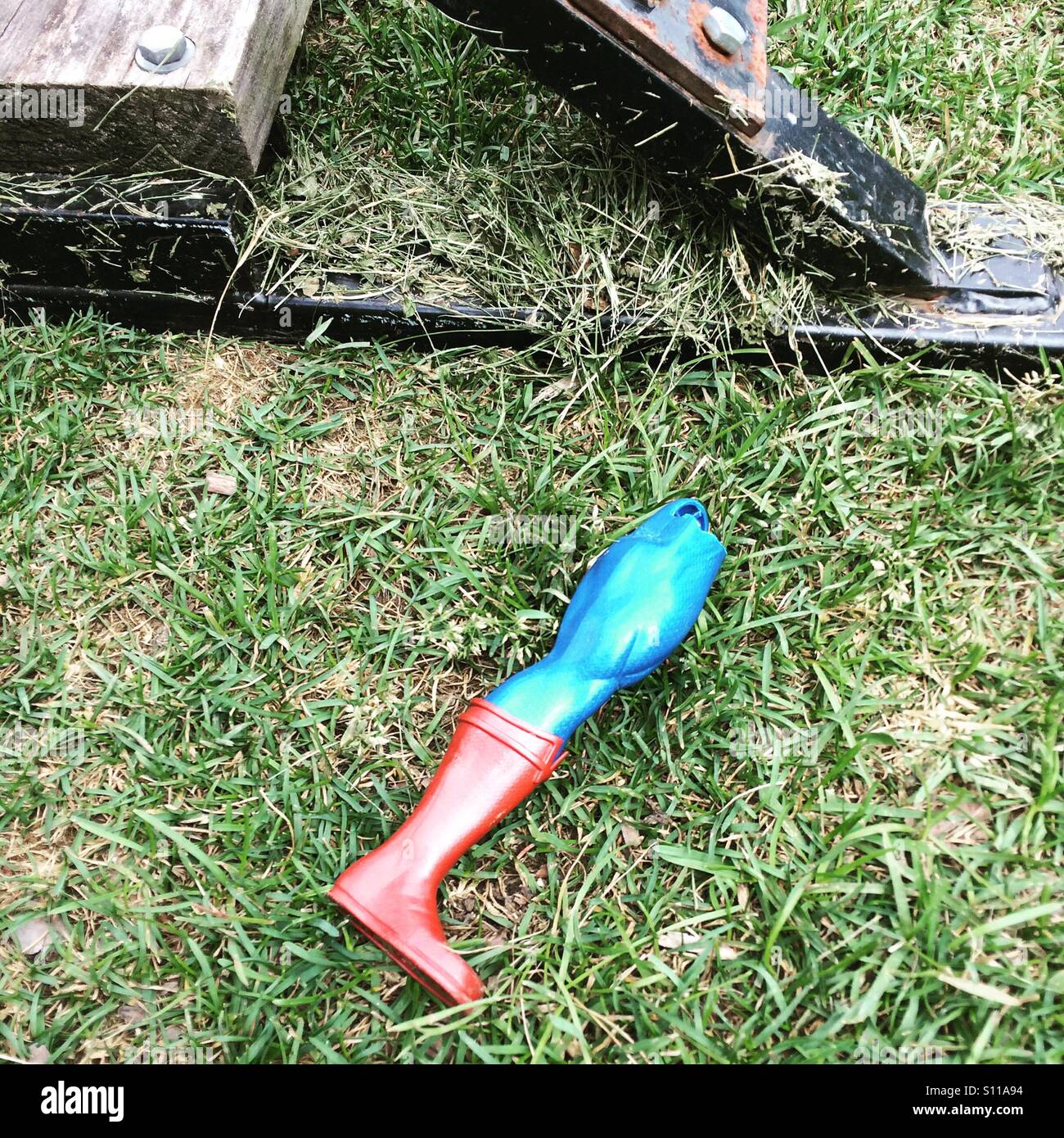 Superhero Toy Leg Stock Photo - Alamy