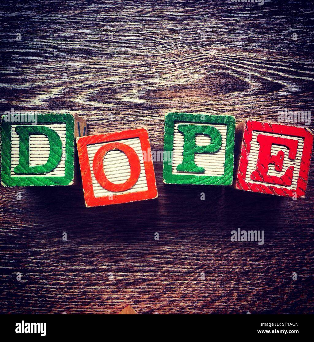 Word DOPE done with wood block alphabet letters Stock Photo - Alamy