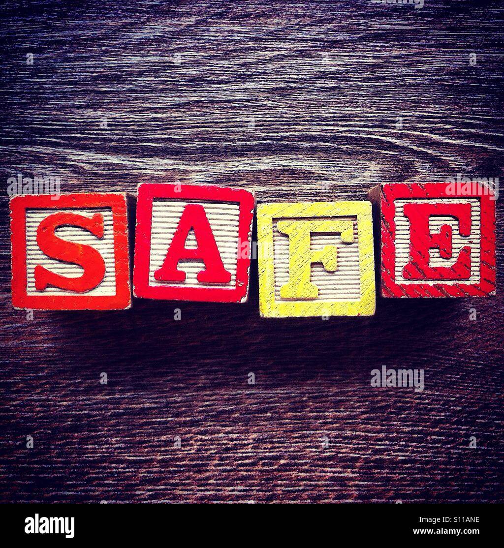 Word SAFE done with alphabet wood blocks letters Stock Photo - Alamy