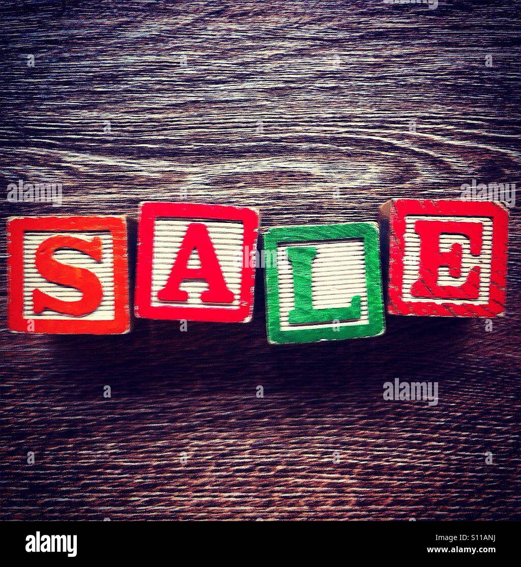 Word SALE done with alphabet wood blocks letters Stock Photo - Alamy