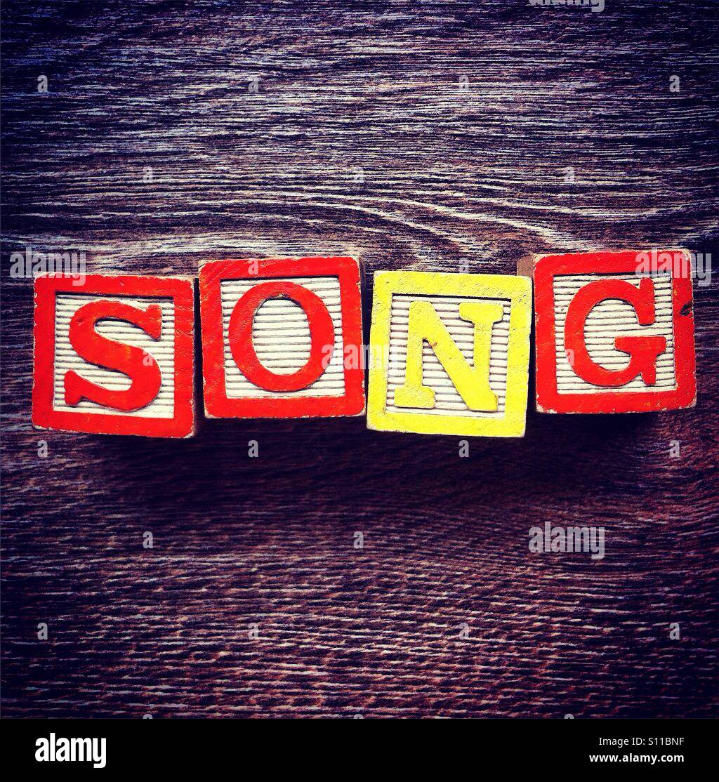 Word SONG done with alphabet wood blocks letters Stock Photo - Alamy