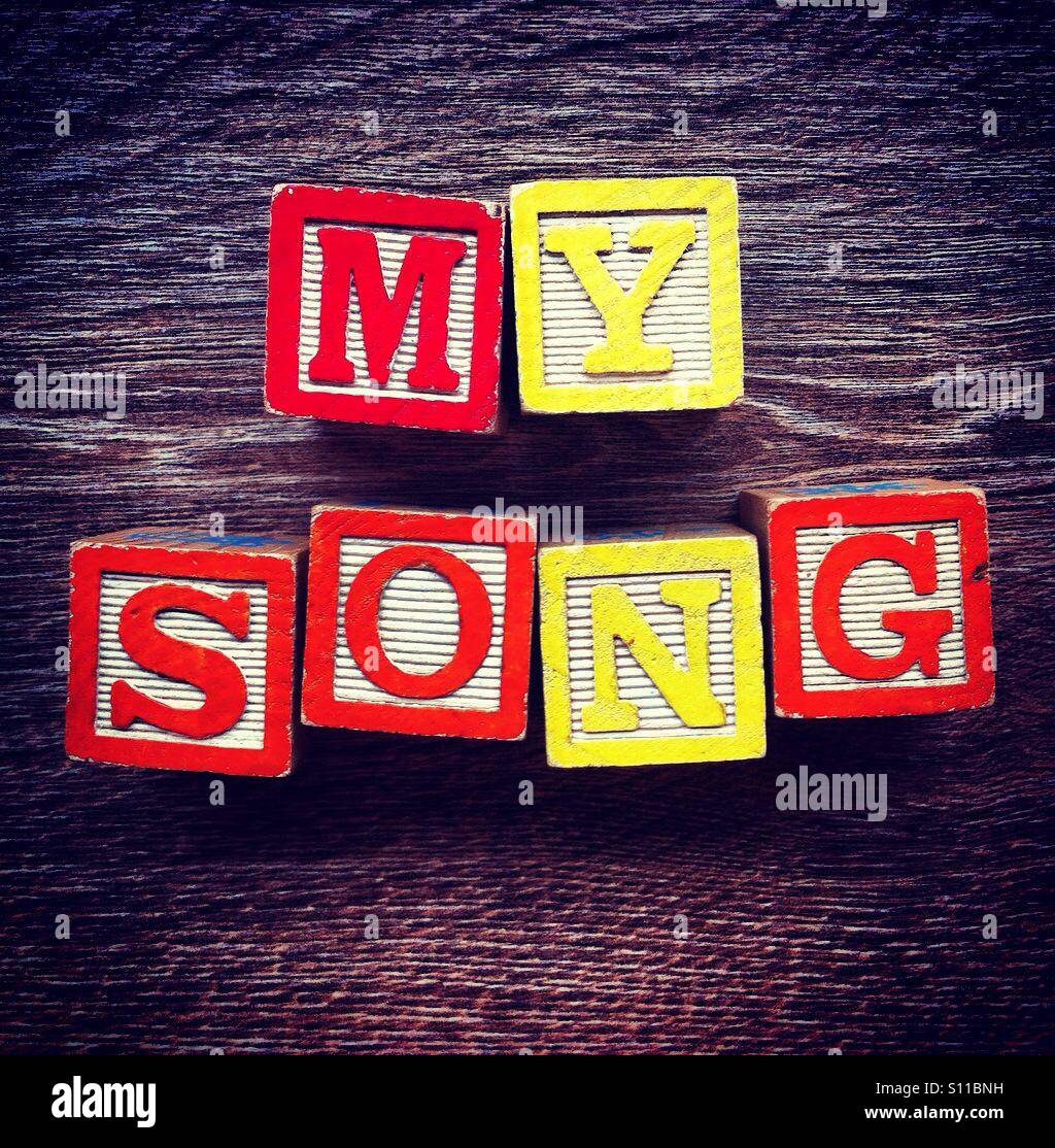 Words MY SONG done with alphabet wood blocks letters Stock Photo - Alamy
