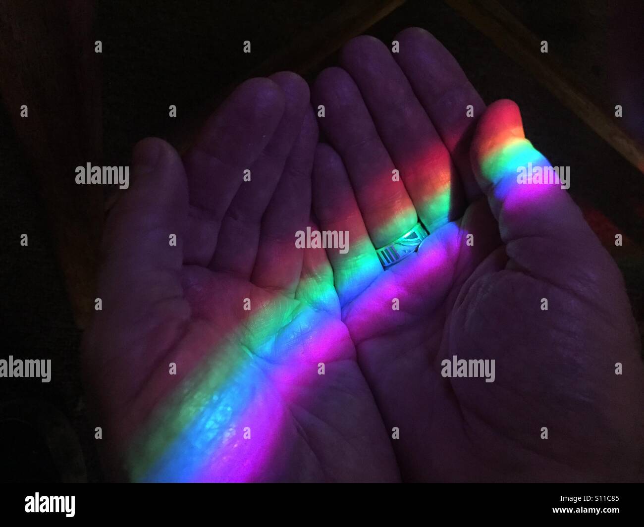 Rainbow hands hi-res stock photography and images - Alamy