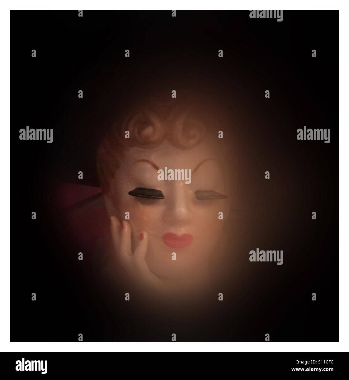 Porcelain face of a woman Stock Photo - Alamy