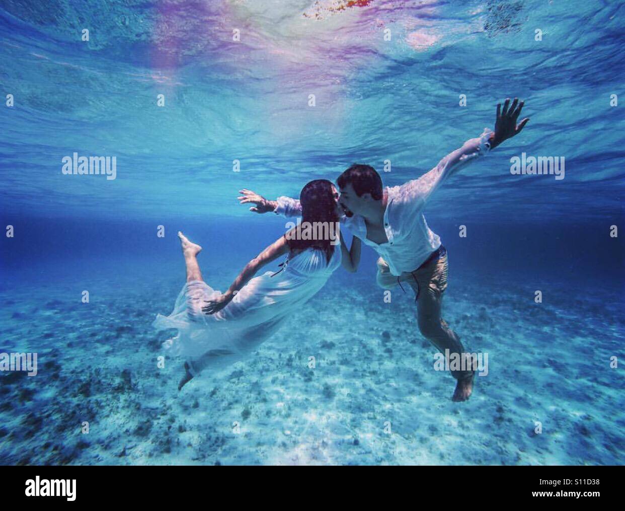 Caribbean couple underwater hi-res stock photography and images - Alamy