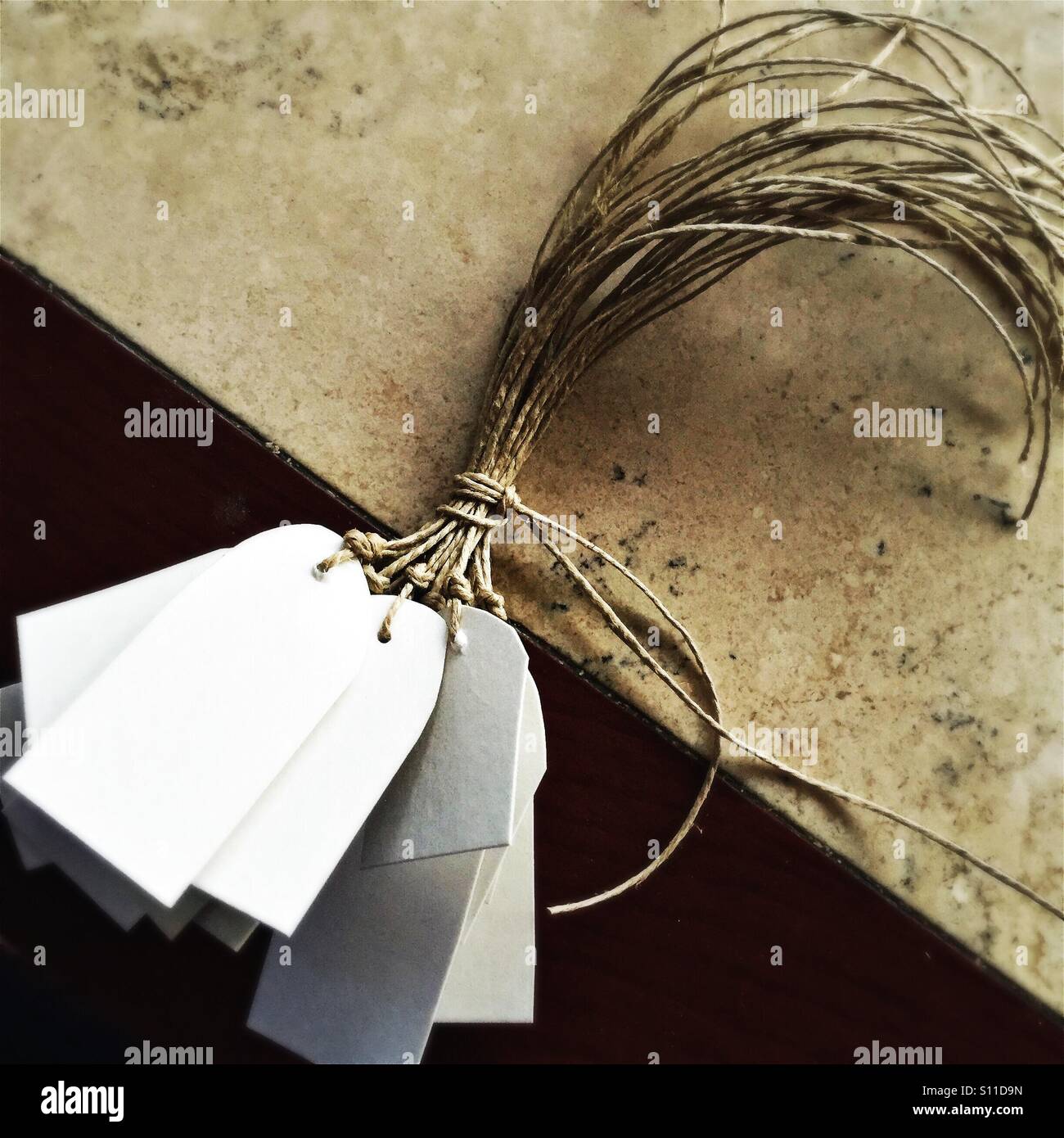 Rustic home made tags Stock Photo - Alamy