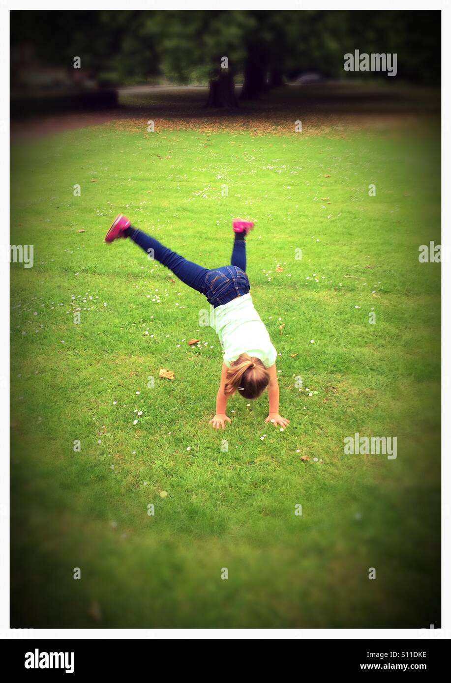 Cartwheel gymnastics hi-res stock photography and images - Alamy