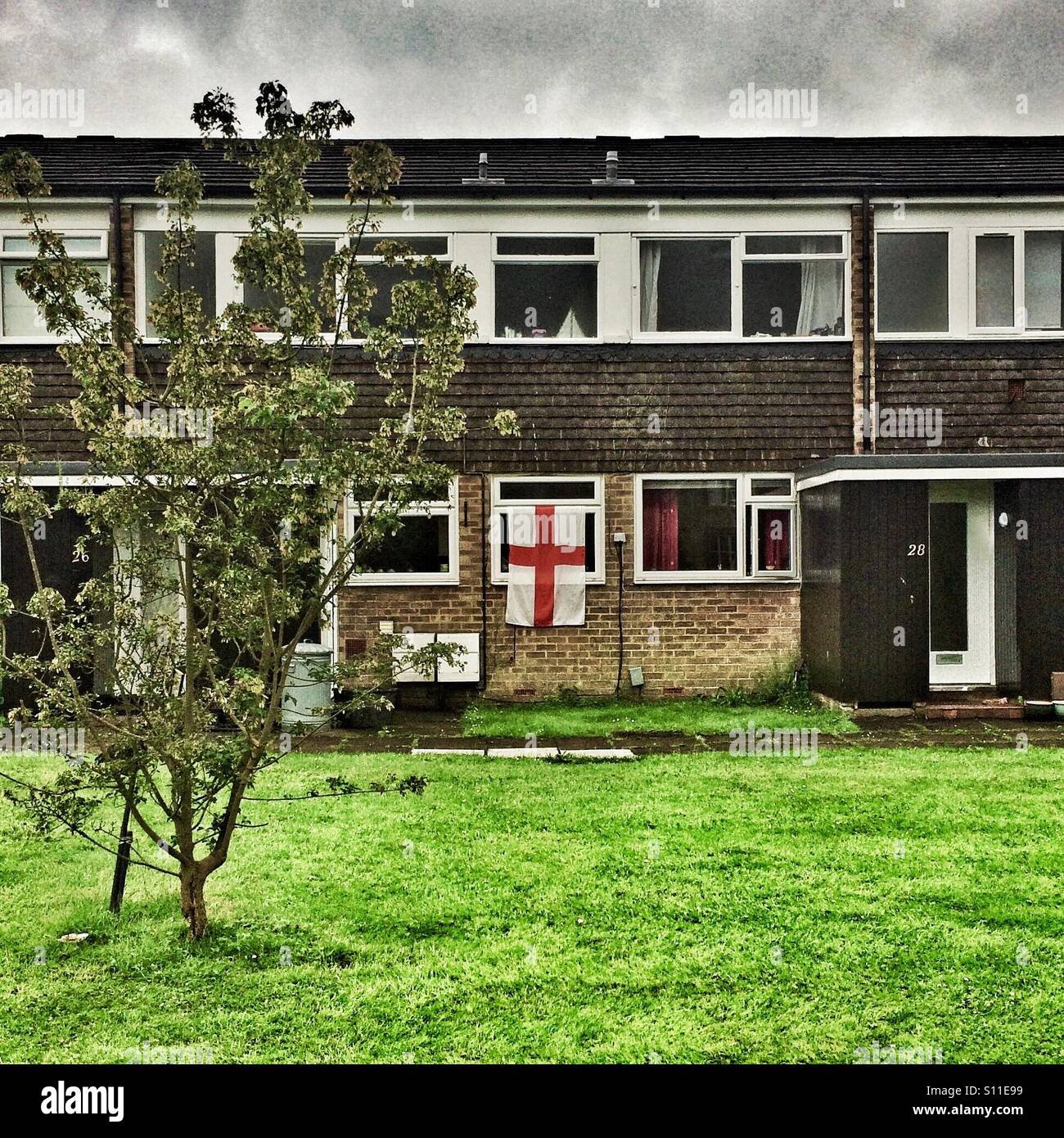 Supporting England in suburbia Stock Photo - Alamy