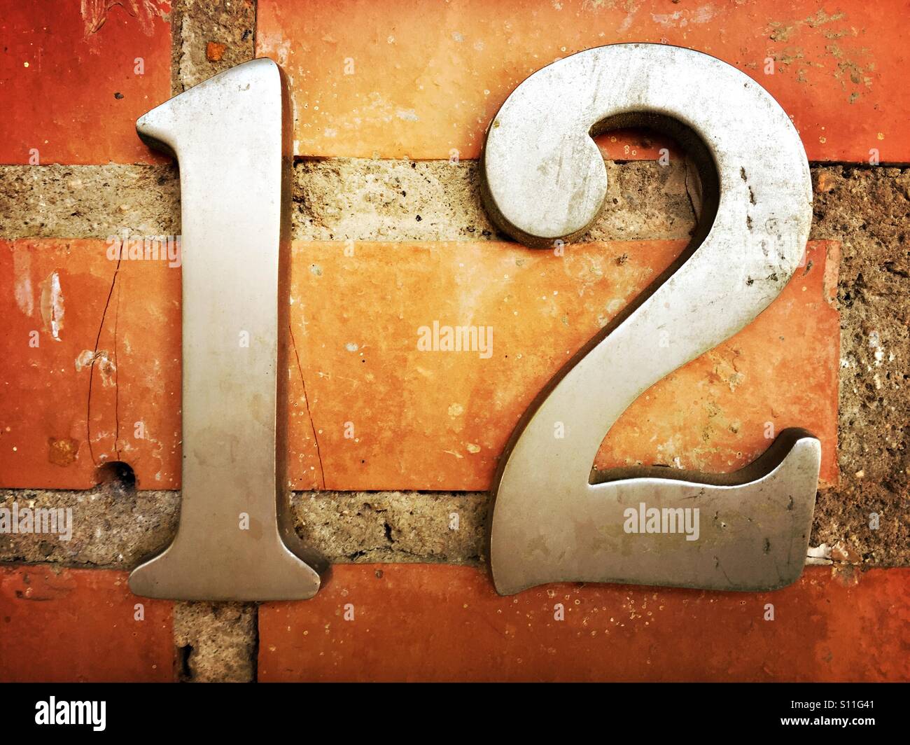 Number 12 in metal lettering Stock Photo - Alamy