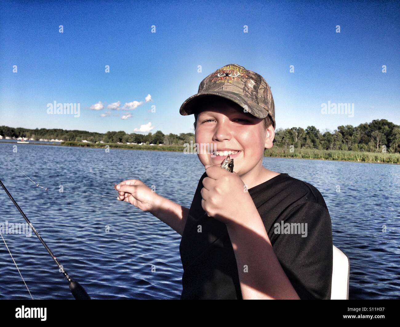 Kid fish hi-res stock photography and images - Alamy