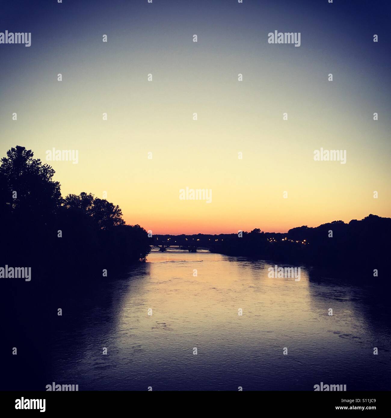 Sunset over the river Stock Photo - Alamy