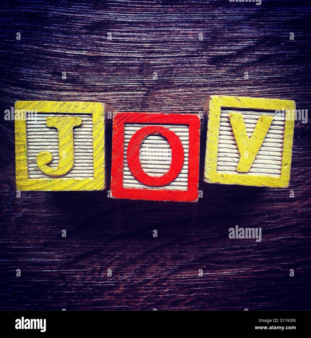 Word JOY done with alphabet wood blocks letters Stock Photo - Alamy