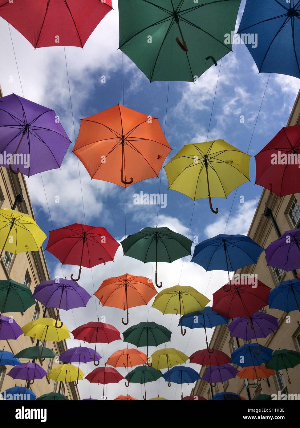 Floating umbrella hi-res stock photography and images - Alamy