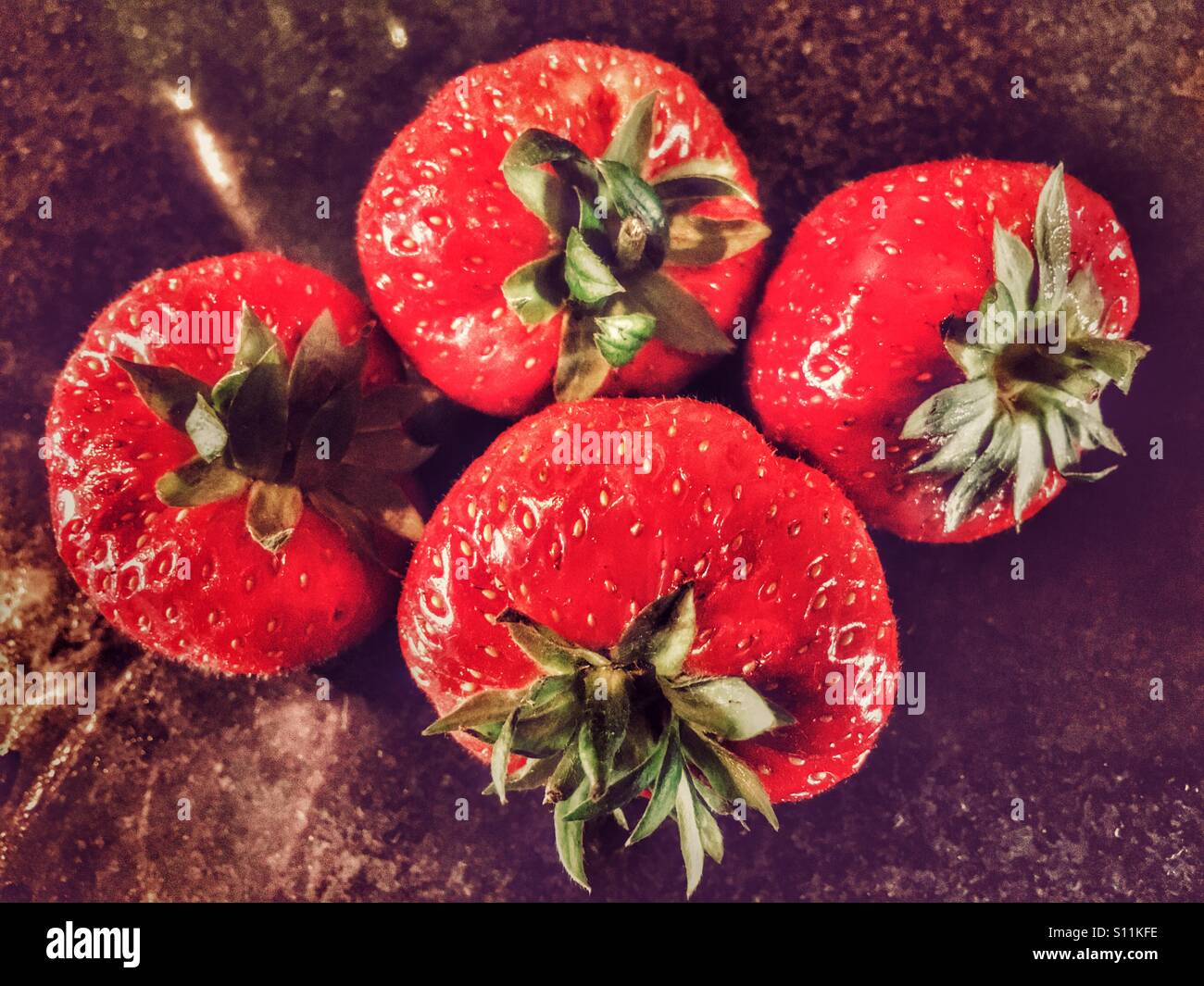 4 strawberries hi-res stock photography and images - Alamy