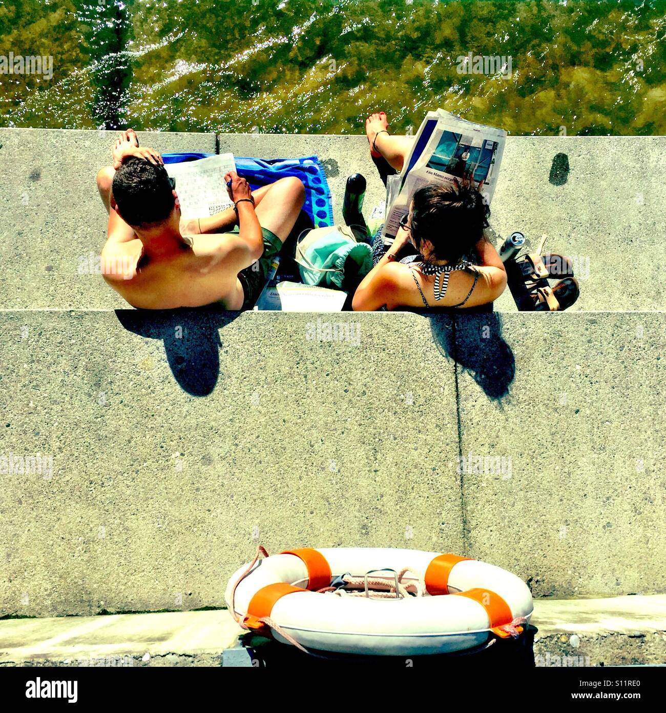 Sun tanning hi-res stock photography and images - Alamy
