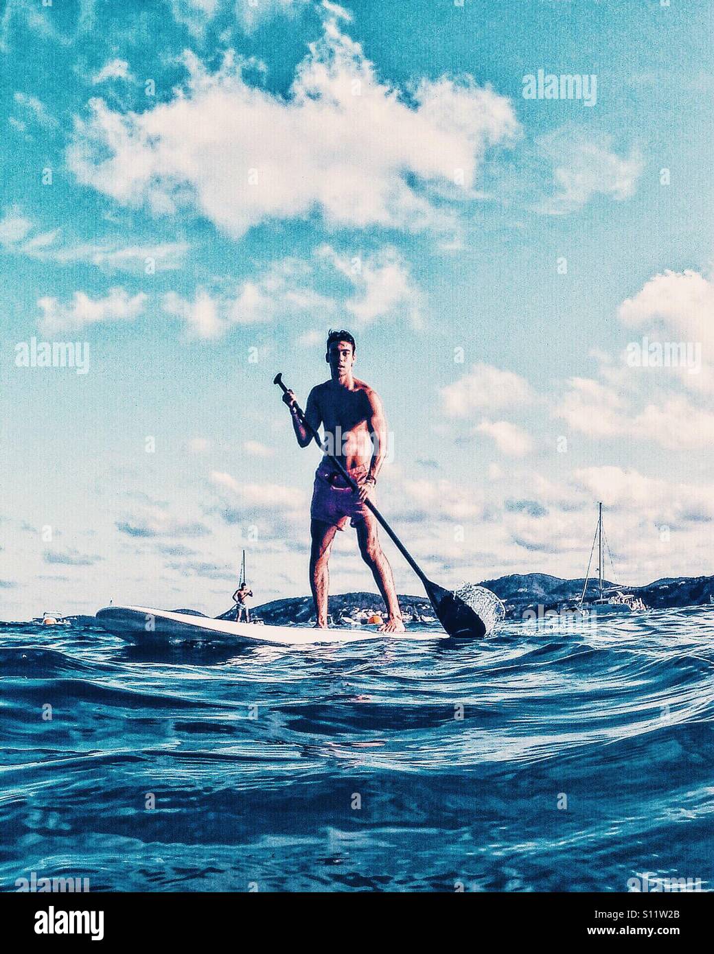 Paddle surf hi-res stock photography and images - Alamy