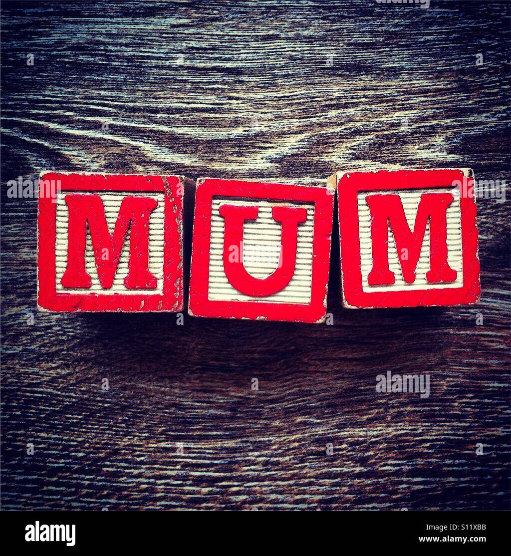 MUM word done with wood blocks letters Stock Photo - Alamy