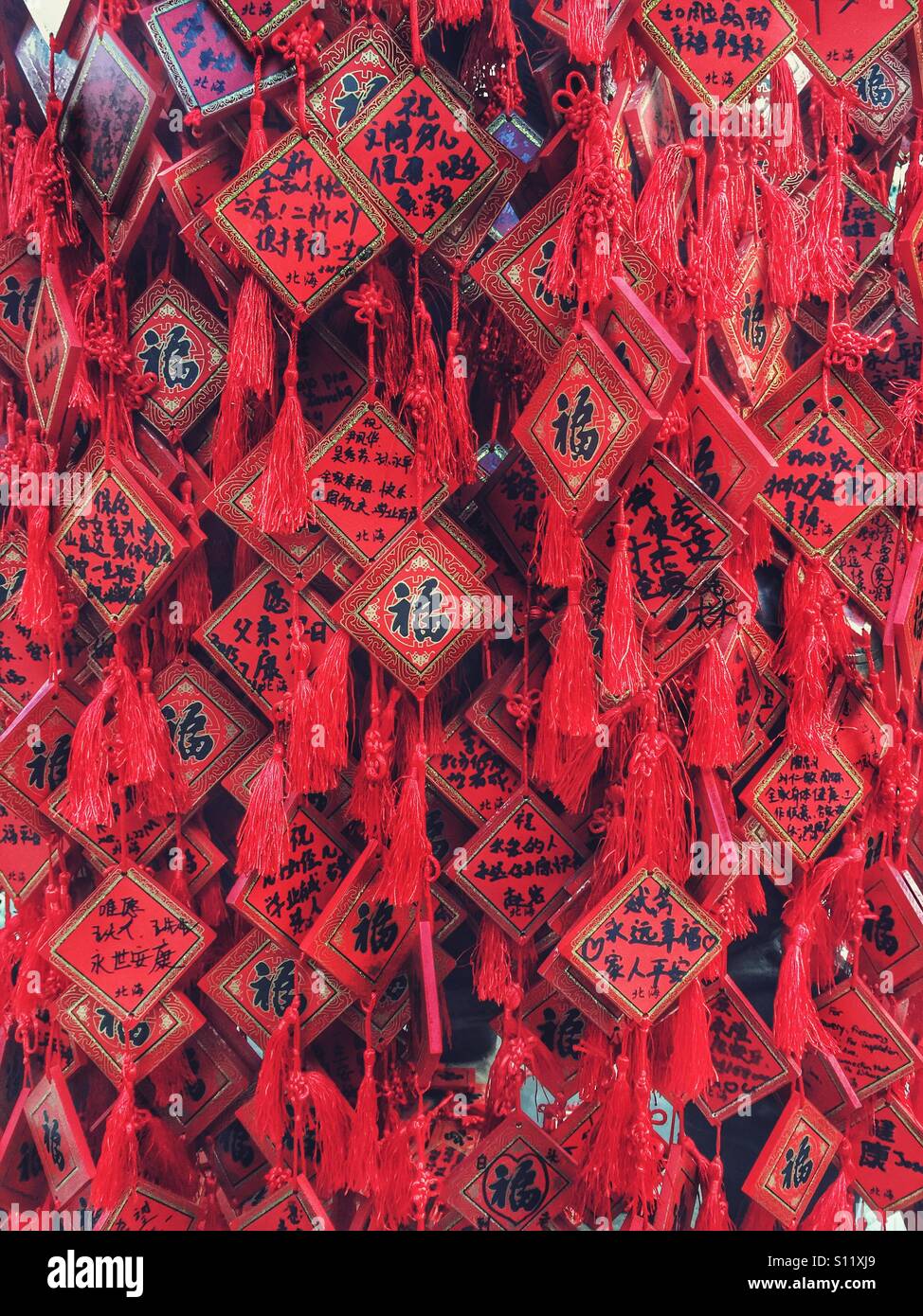 Traditional lucky wishes in Chinese temple Stock Photo - Alamy