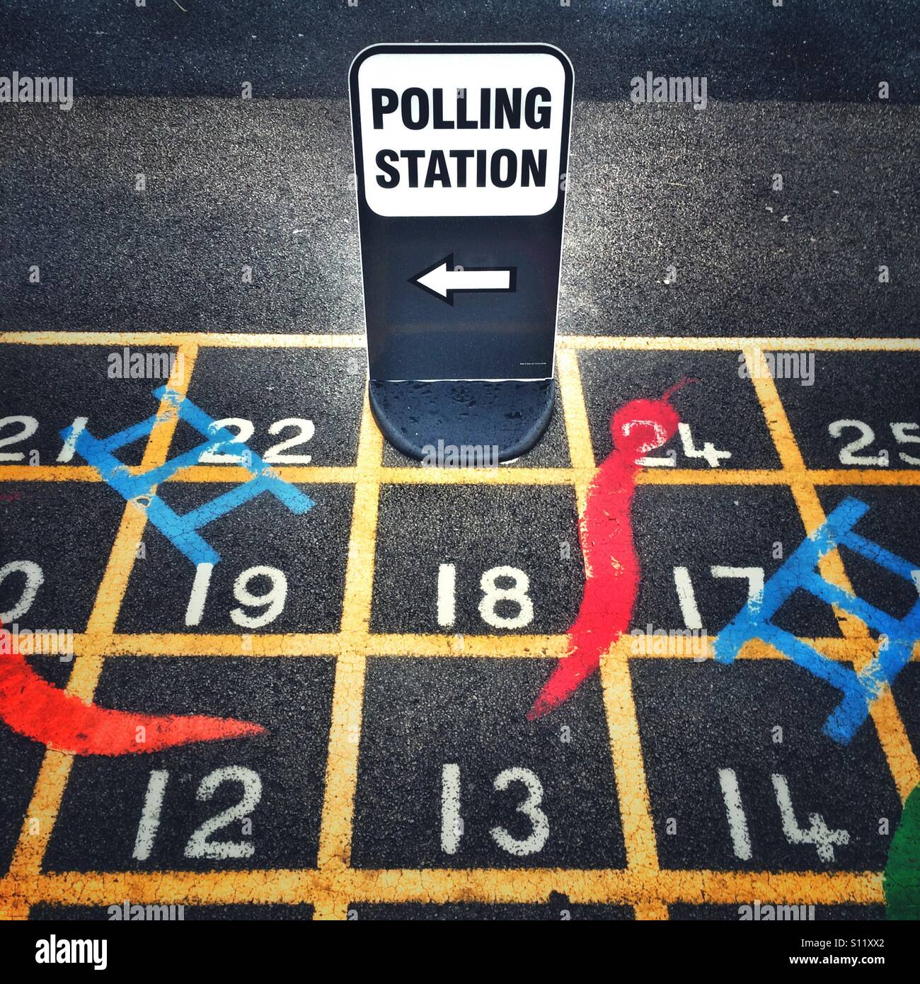 Polling Station sign on a Snakes and Ladders board Stock Photo - Alamy