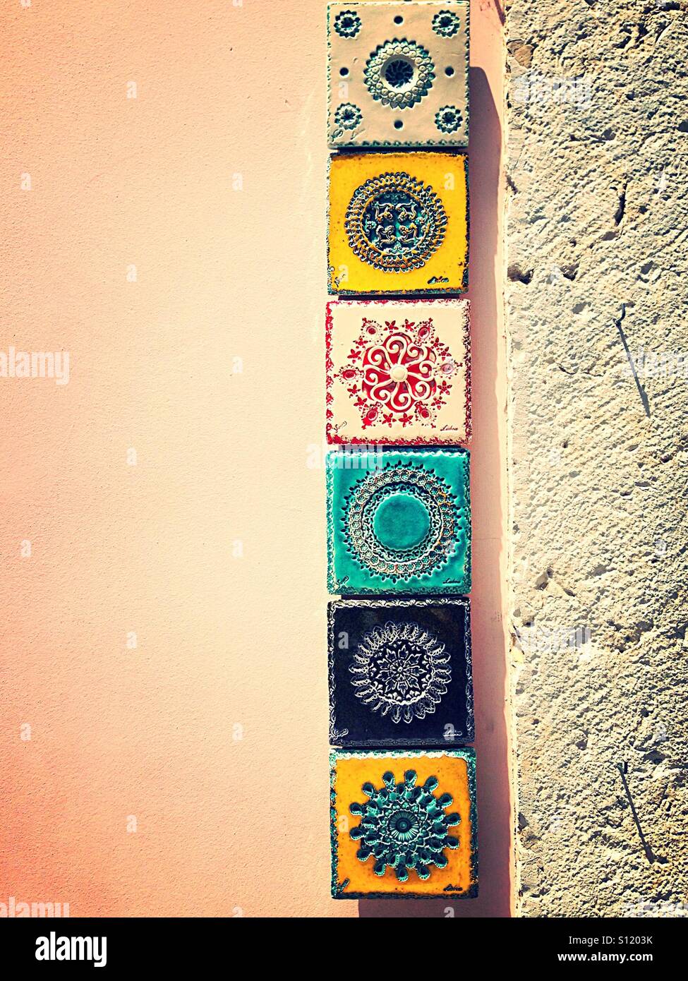 Colorful tiles on building's facade Stock Photo - Alamy