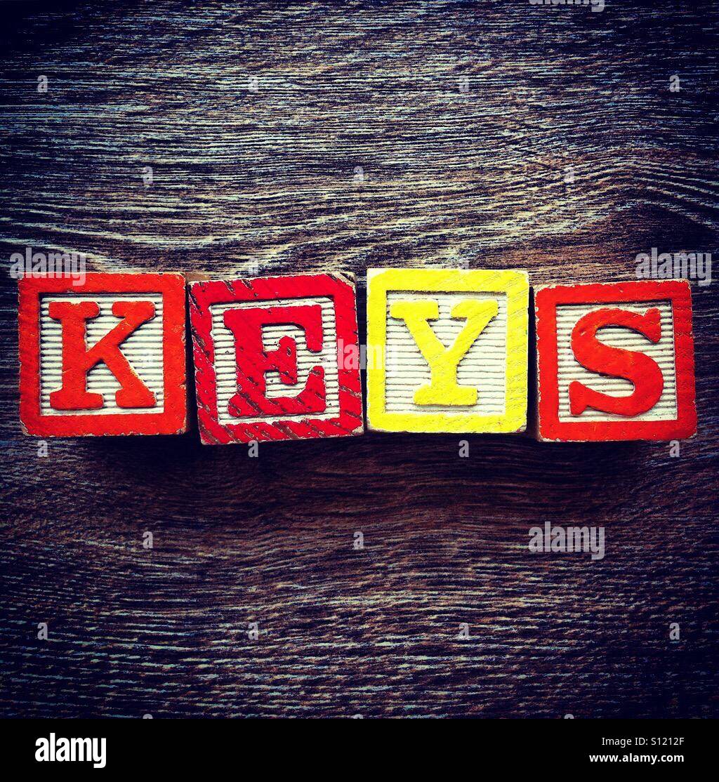KEYS word done with alphabet wood blocks letters Stock Photo - Alamy
