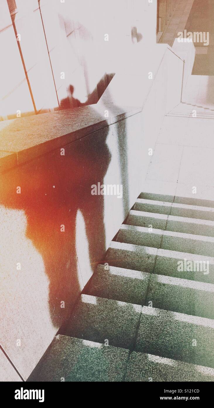 Broken shadow of a man Stock Photo - Alamy