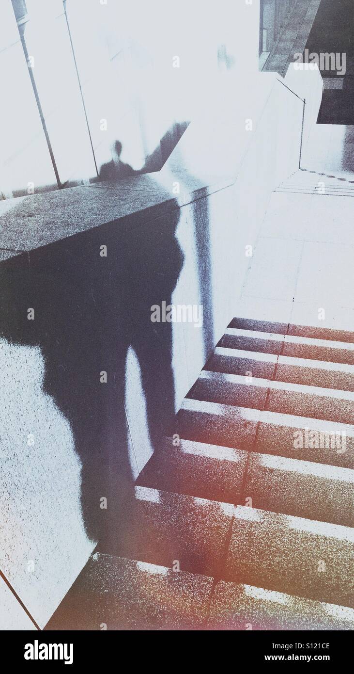 Broken shadow of a man Stock Photo - Alamy
