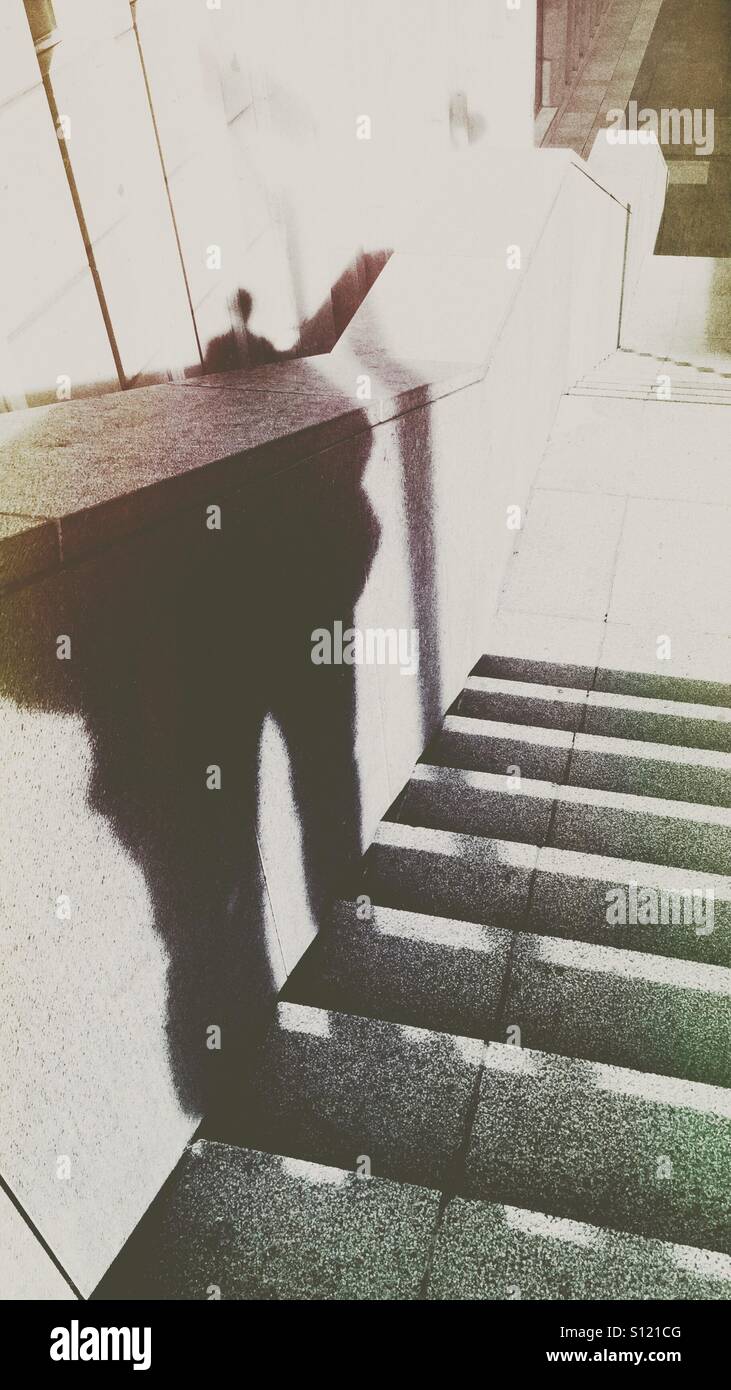 Broken shadow of a man Stock Photo - Alamy