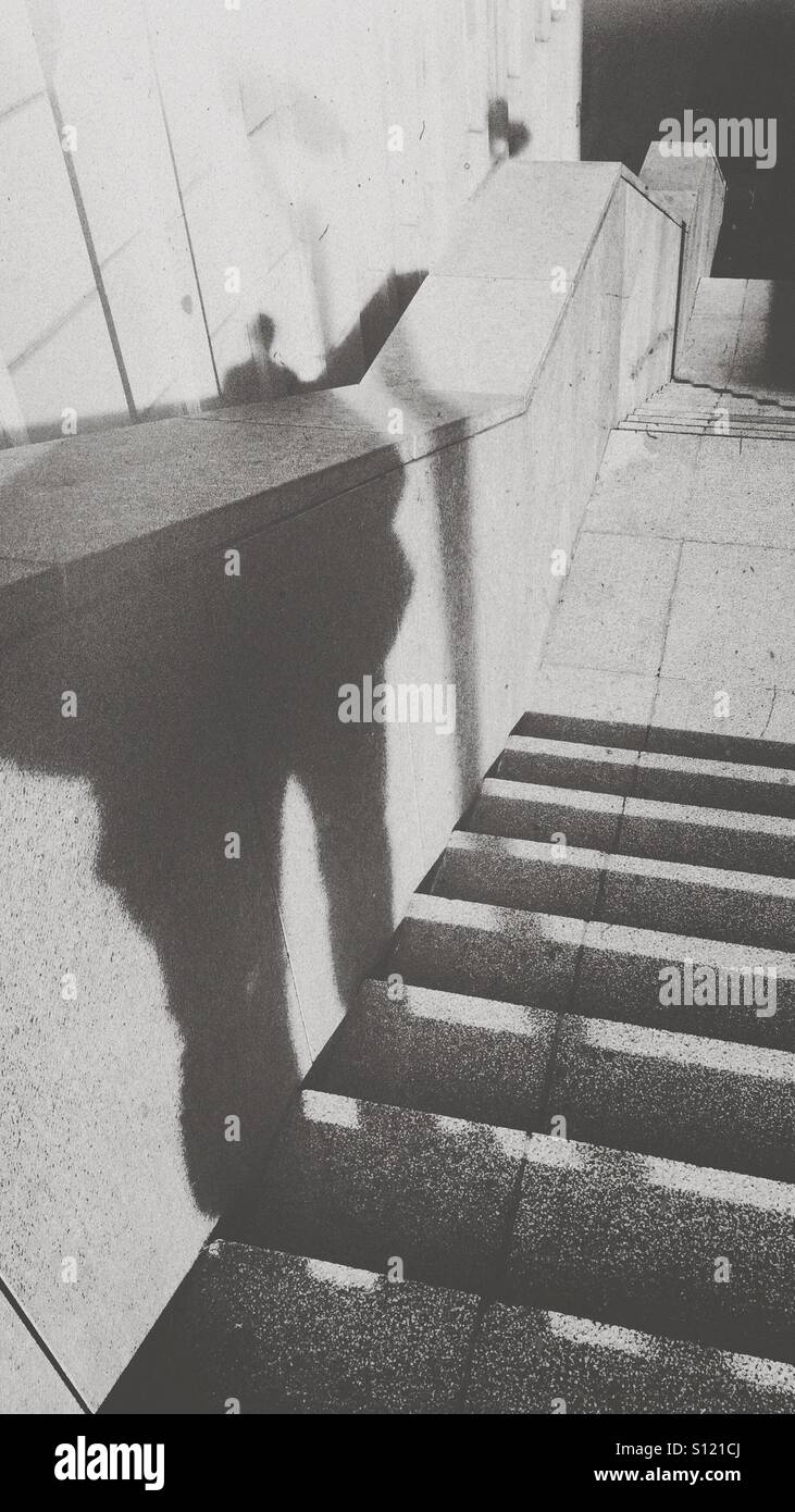 Broken shadow of a man Stock Photo - Alamy