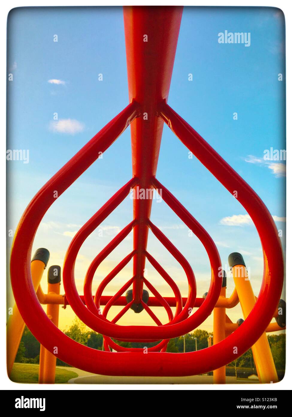 Red monkey bars on child's playground Stock Photo - Alamy