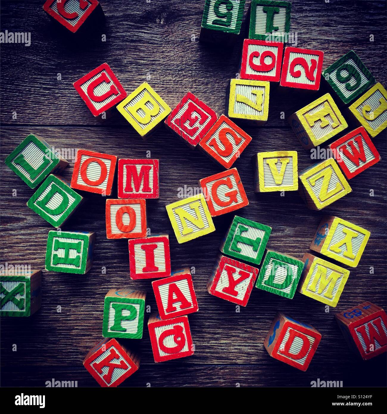 Bunch of alphabet wood block letter toys Stock Photo - Alamy
