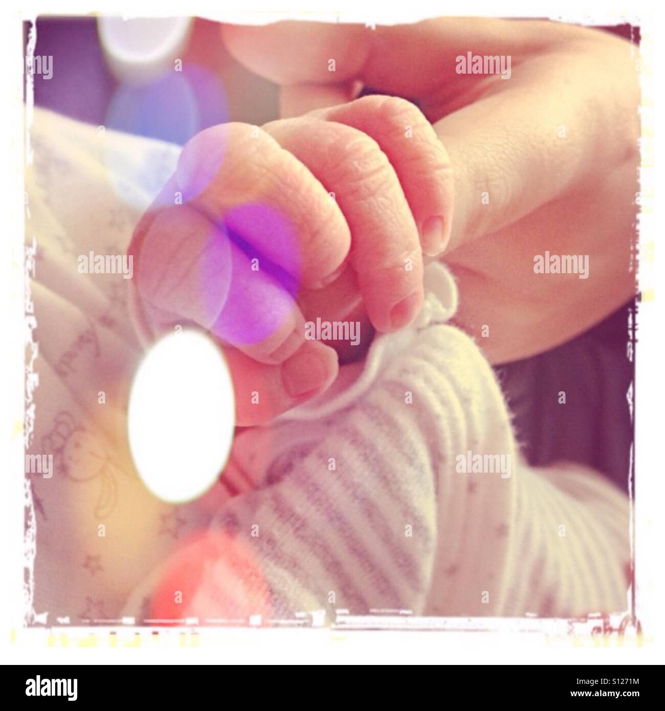 Finger grip baby hi-res stock photography and images - Alamy