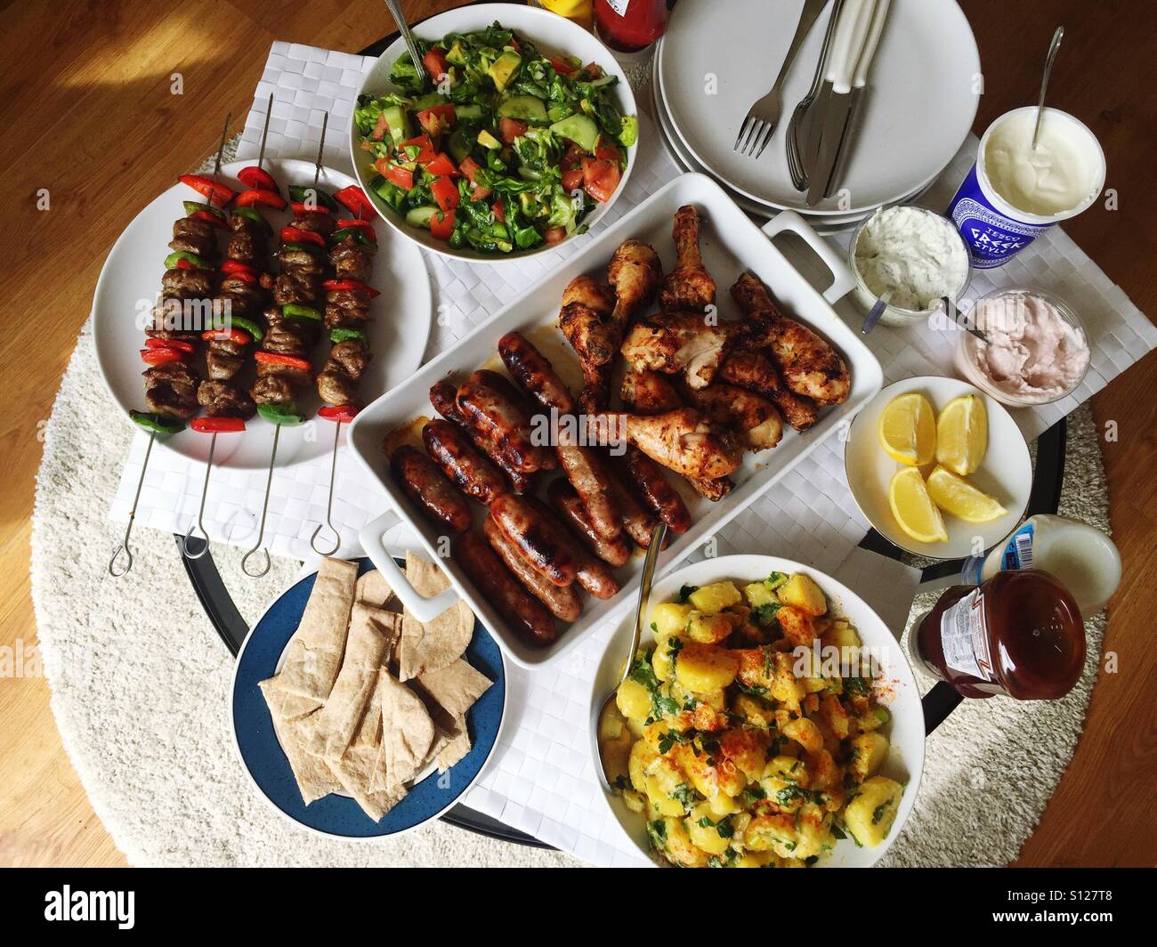 A table of barbecued food Stock Photo - Alamy