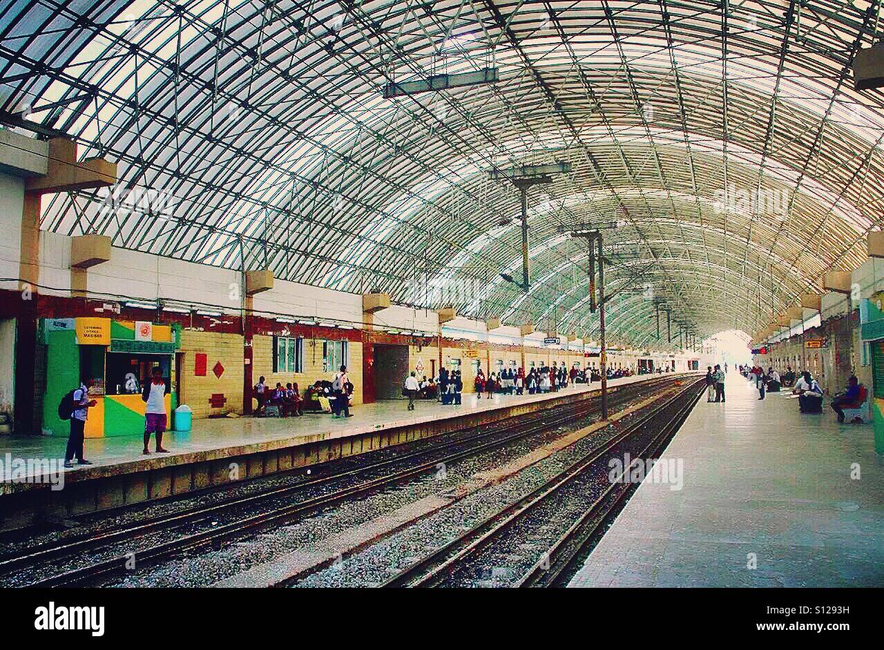 Waiting for a train journey to home Stock Photo - Alamy