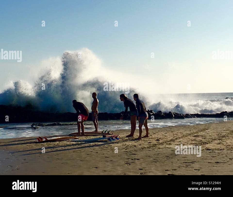 Surfers off guard Stock Photo - Alamy