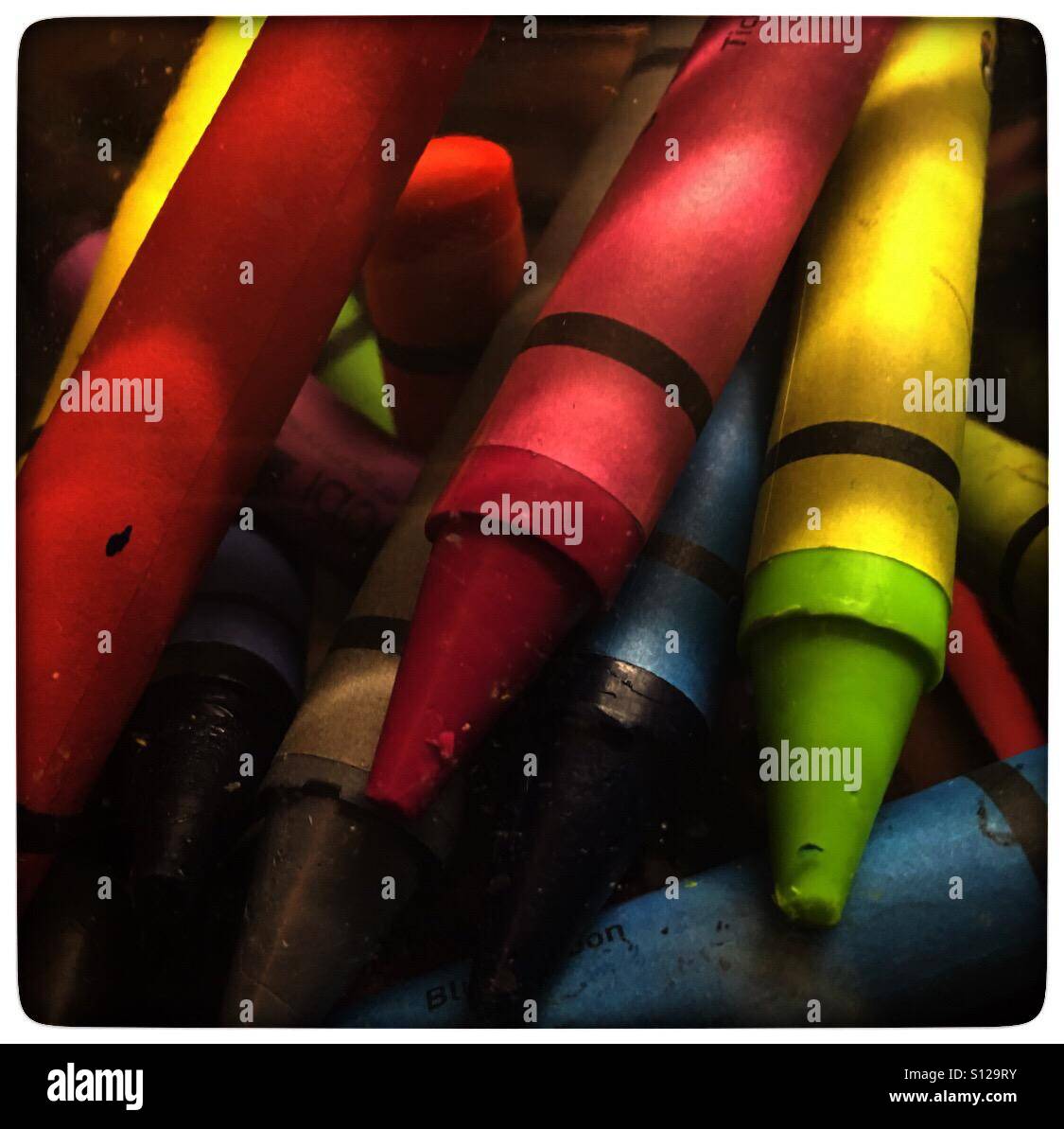 Crayons in a plastic bucket Stock Photo - Alamy