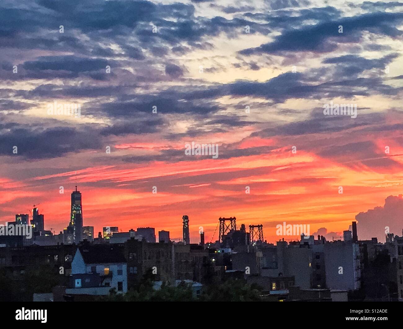 Beautiful sunset over New York City from a window in Williamsburg ...