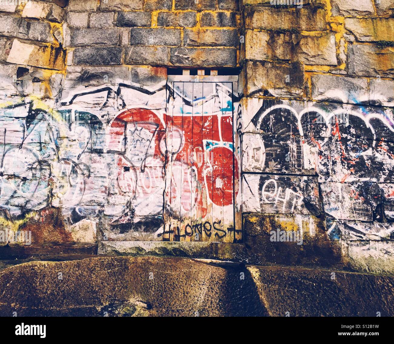 Graffiti covered wall hi-res stock photography and images - Alamy