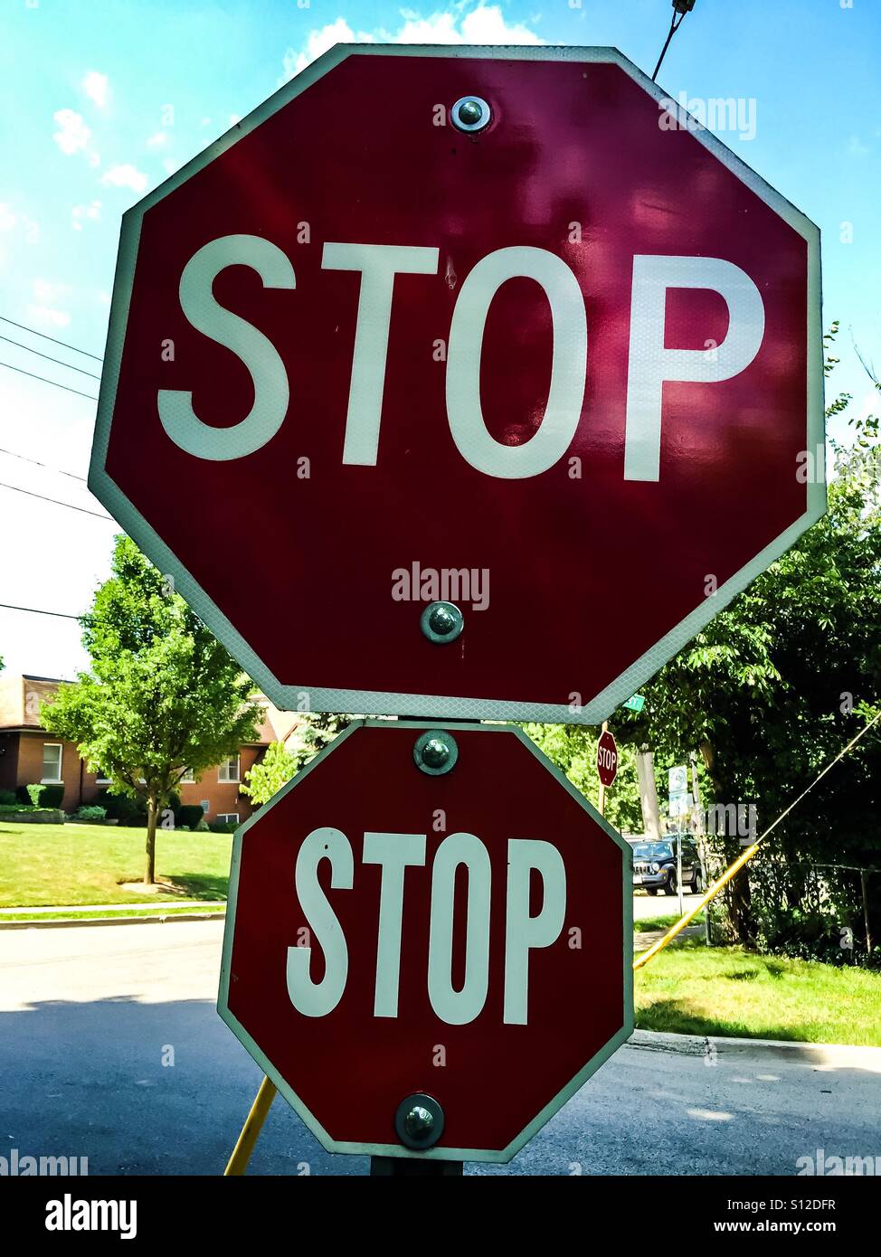 Two Stop Signs High Resolution Stock Photography and Images - Alamy