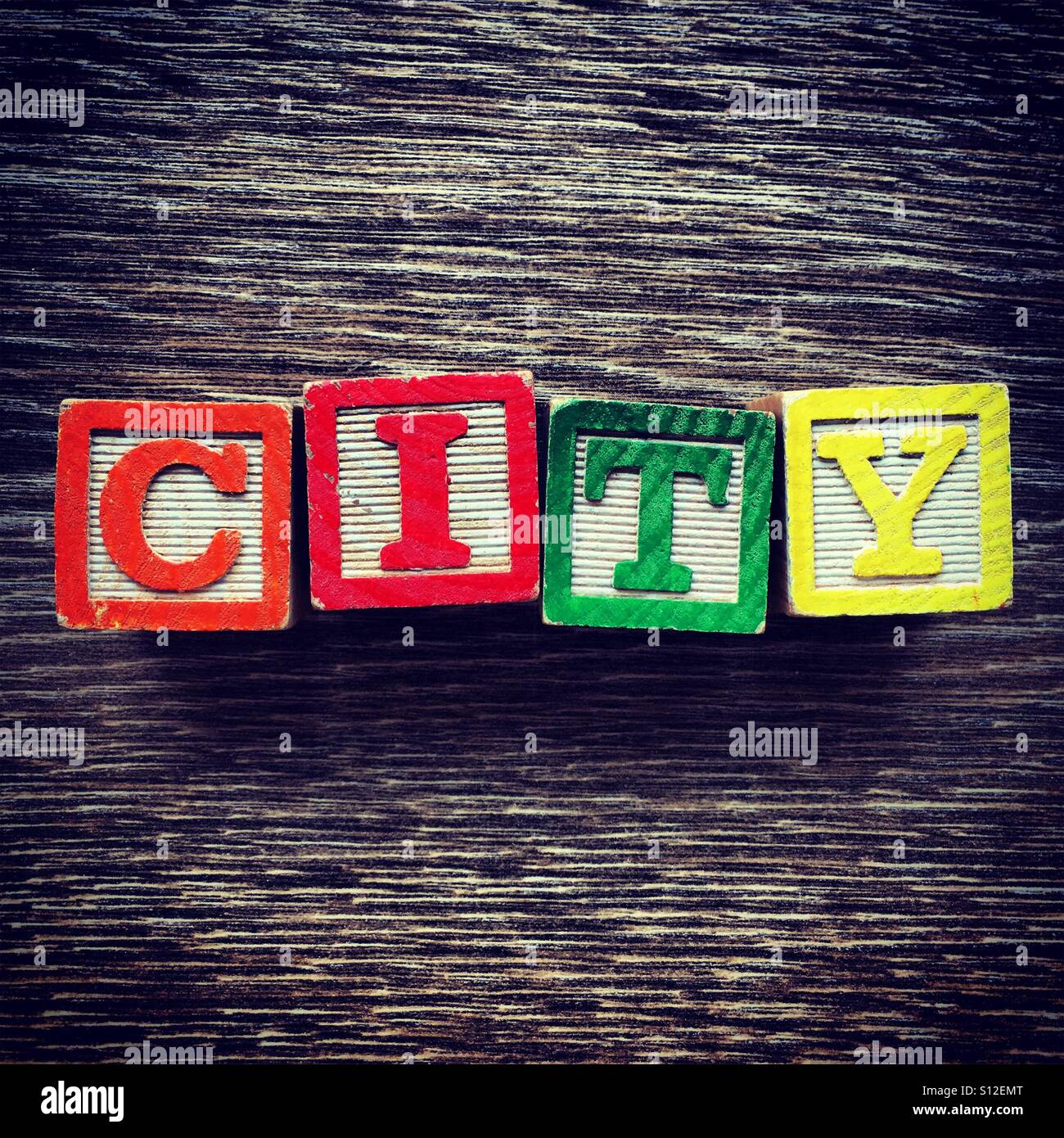 CITY word written with wood block letter toys Stock Photo - Alamy