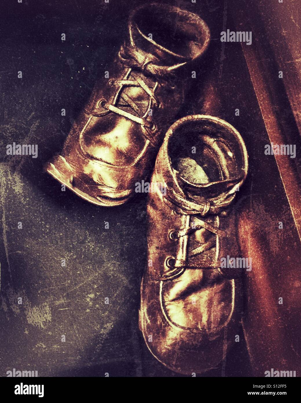 Baby's first shoes are bronzed Stock Photo - Alamy