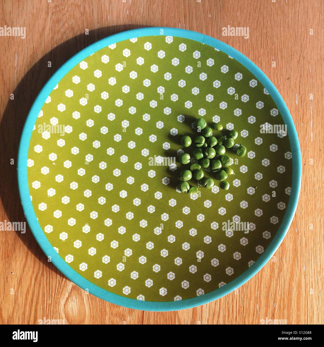 Peas on a Plate Stock Photo - Alamy