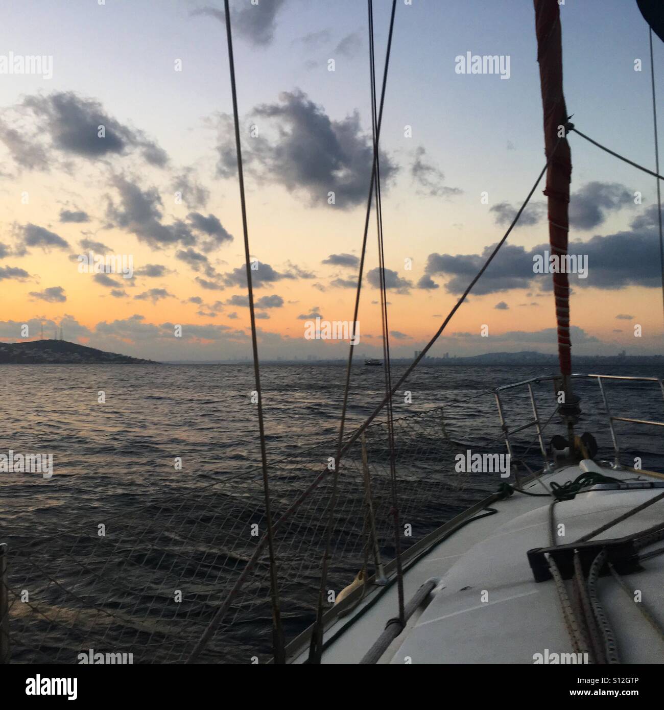 Sun set on the boat Stock Photo - Alamy