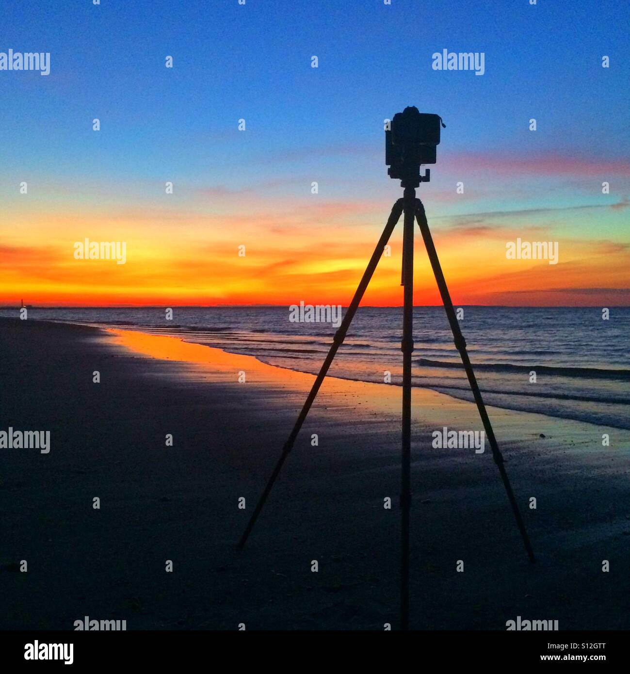 Tripod on beach sunset hi-res stock photography and images - Alamy