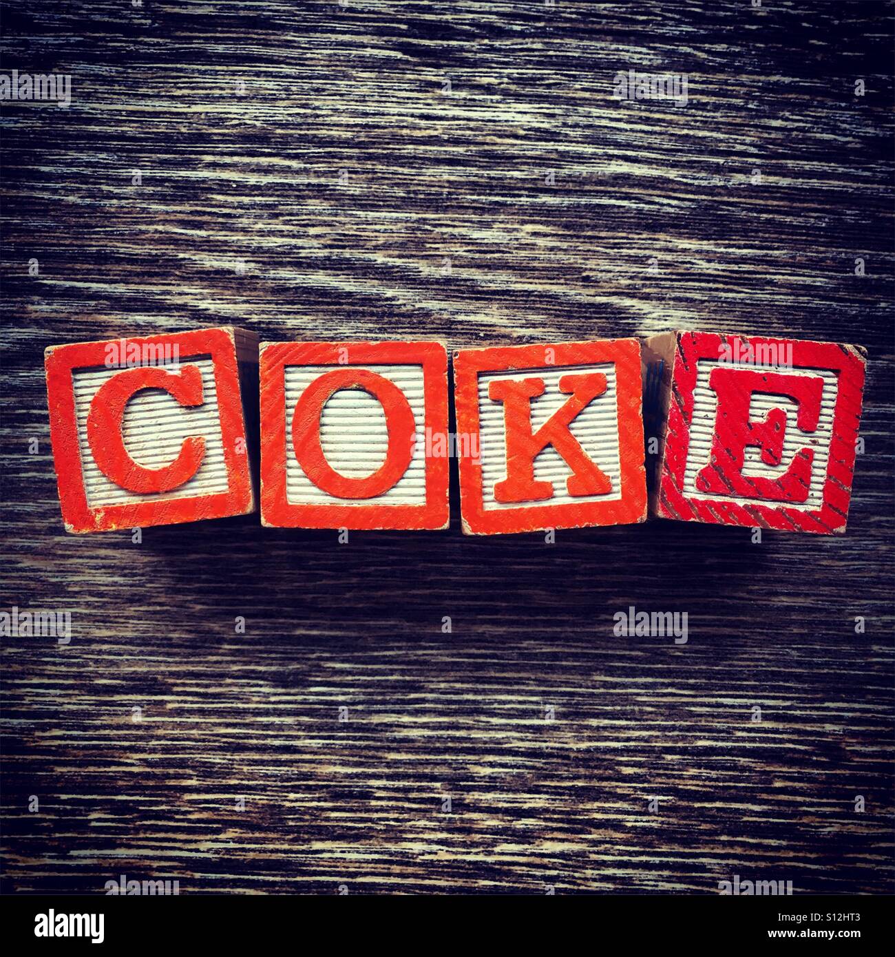 COKE word written with wood block letter toys Stock Photo - Alamy